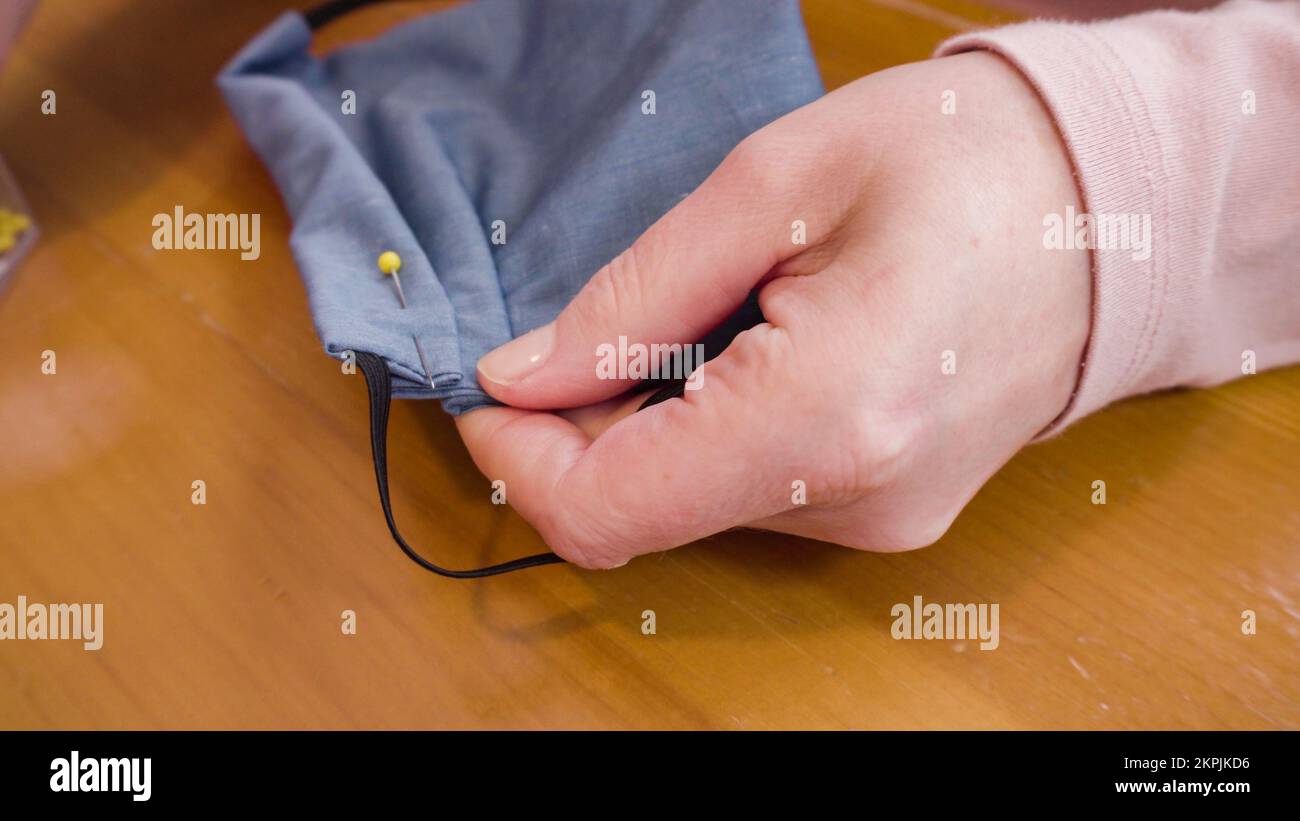 Sewing pins mouth hi-res stock photography and images - Alamy