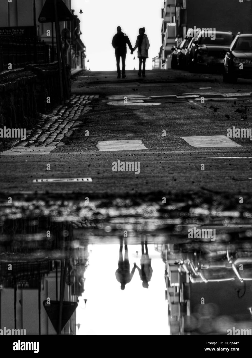 Walking on road in Black and White Stock Photos & Images - Alamy