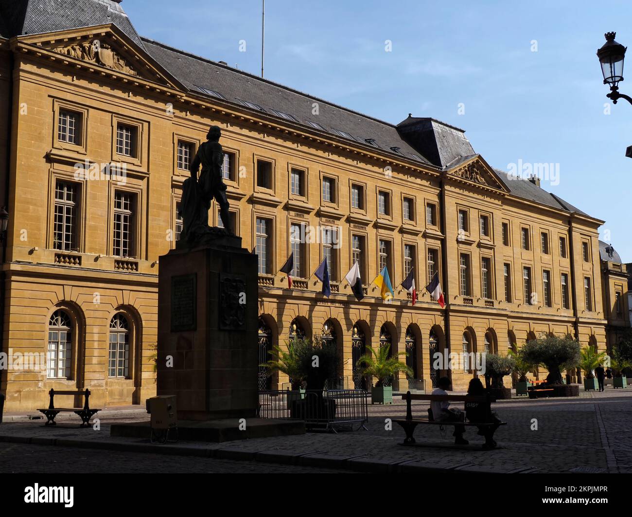 silhouette of Bronze statue of Marshal Fabert in front of the Town Hall ...