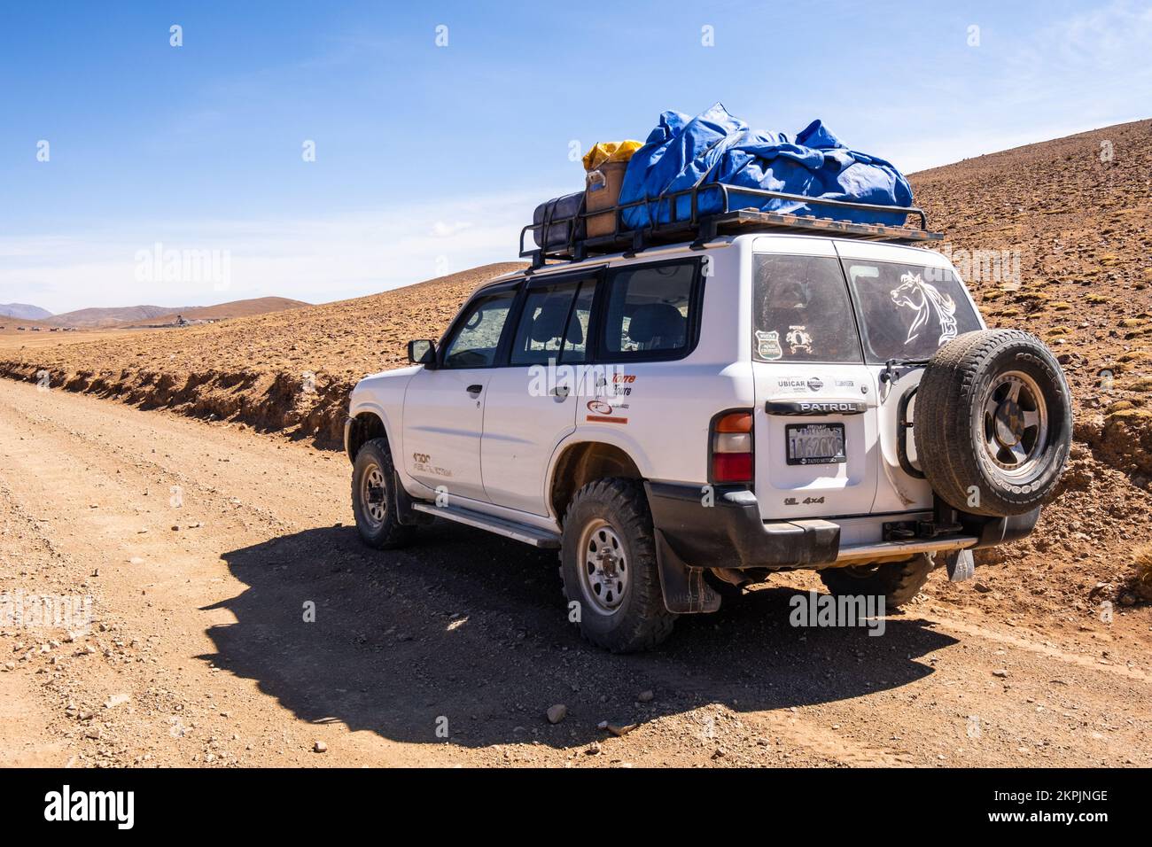 Nissan Patrol of Torre Tours on a stop during an Uyuni guided tour ...