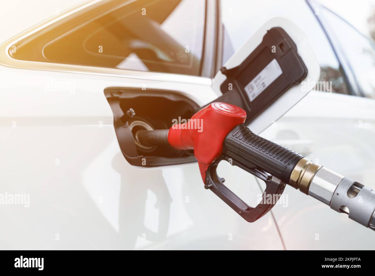 Transport and industry concept. Refilling the car. A refueling valve is ...