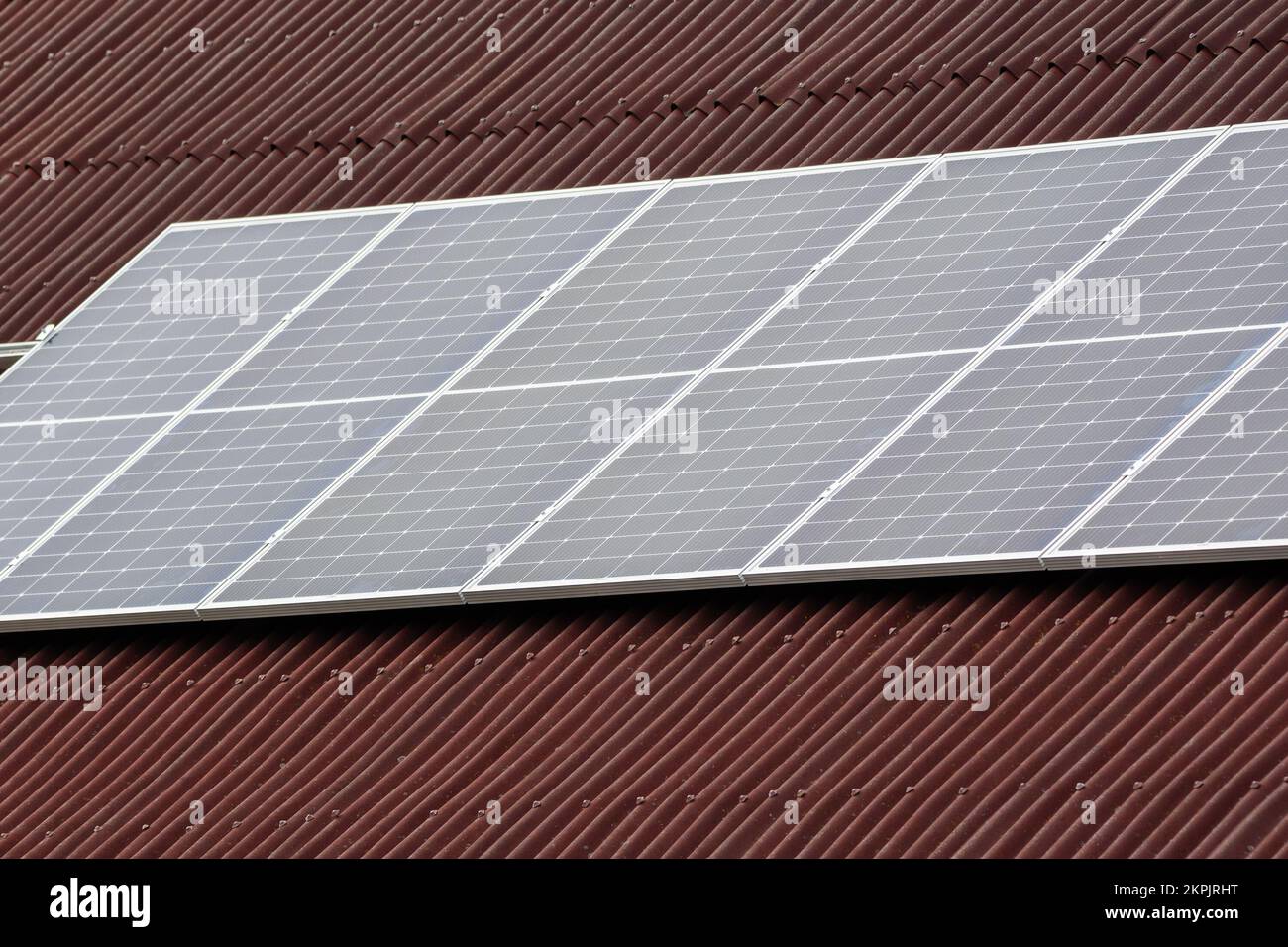 Solar panel line on the roof Stock Photo - Alamy