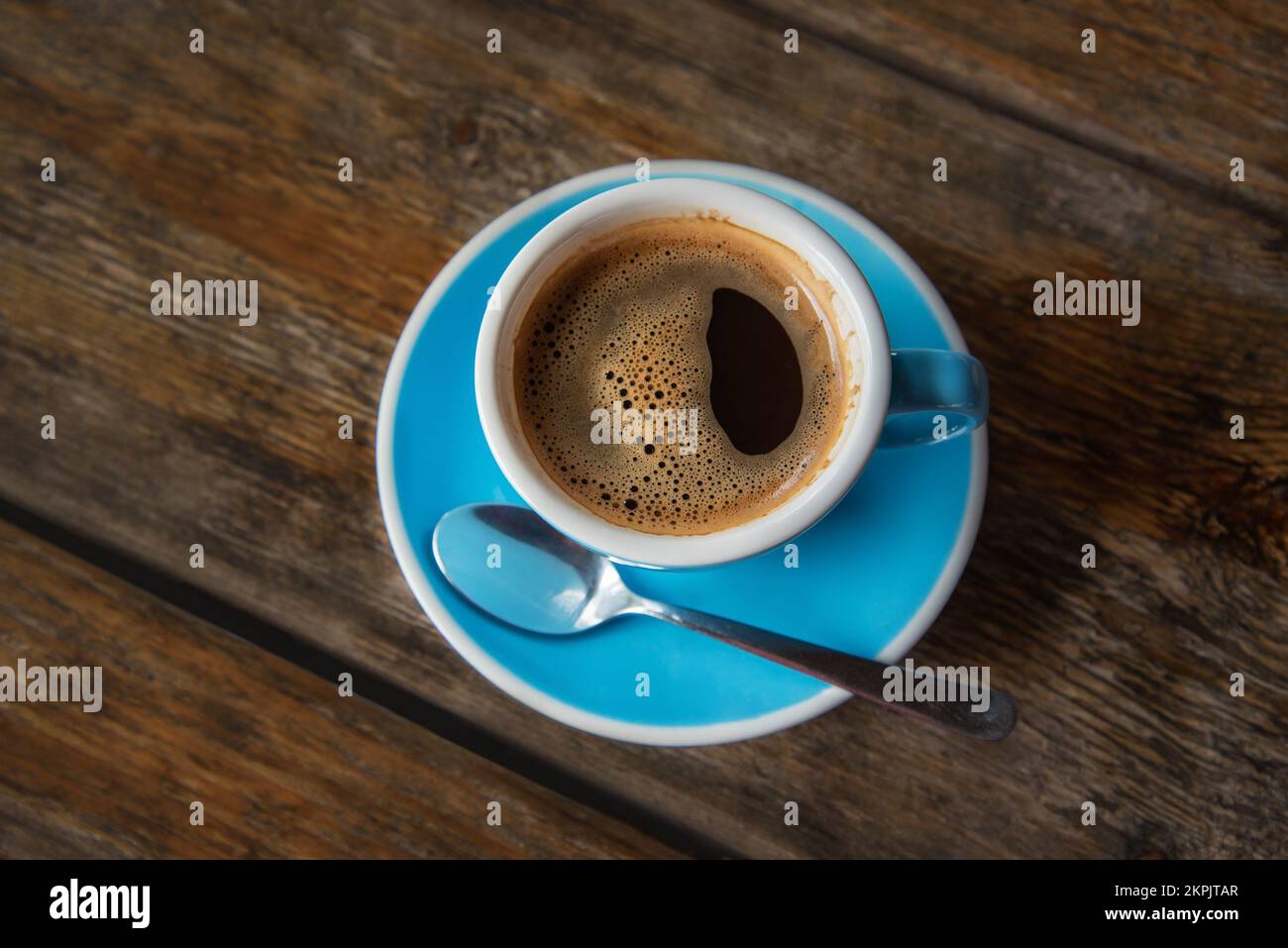 Cup of coffee on the wooden surface Stock Photo - Alamy