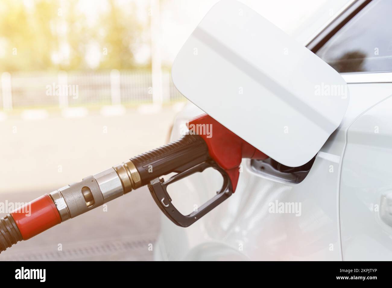 Transport and industry concept. Refilling the car. A refueling valve is ...