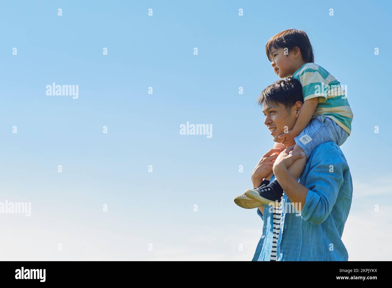 Father son portrait blue shirt hi-res stock photography and images - Alamy