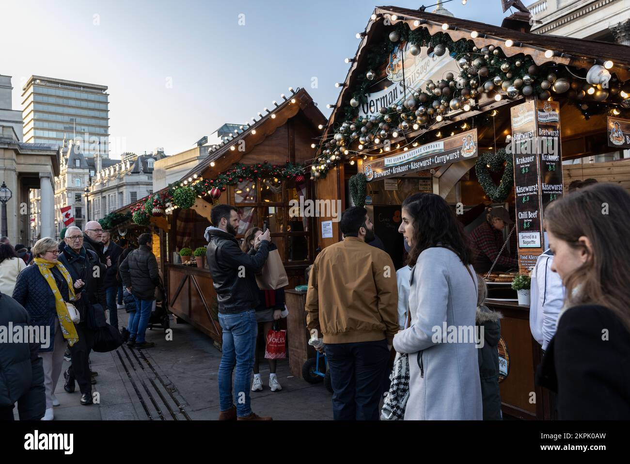 Yuletide Christmas market stalls situated on Trafalgar Square, seasonal ...
