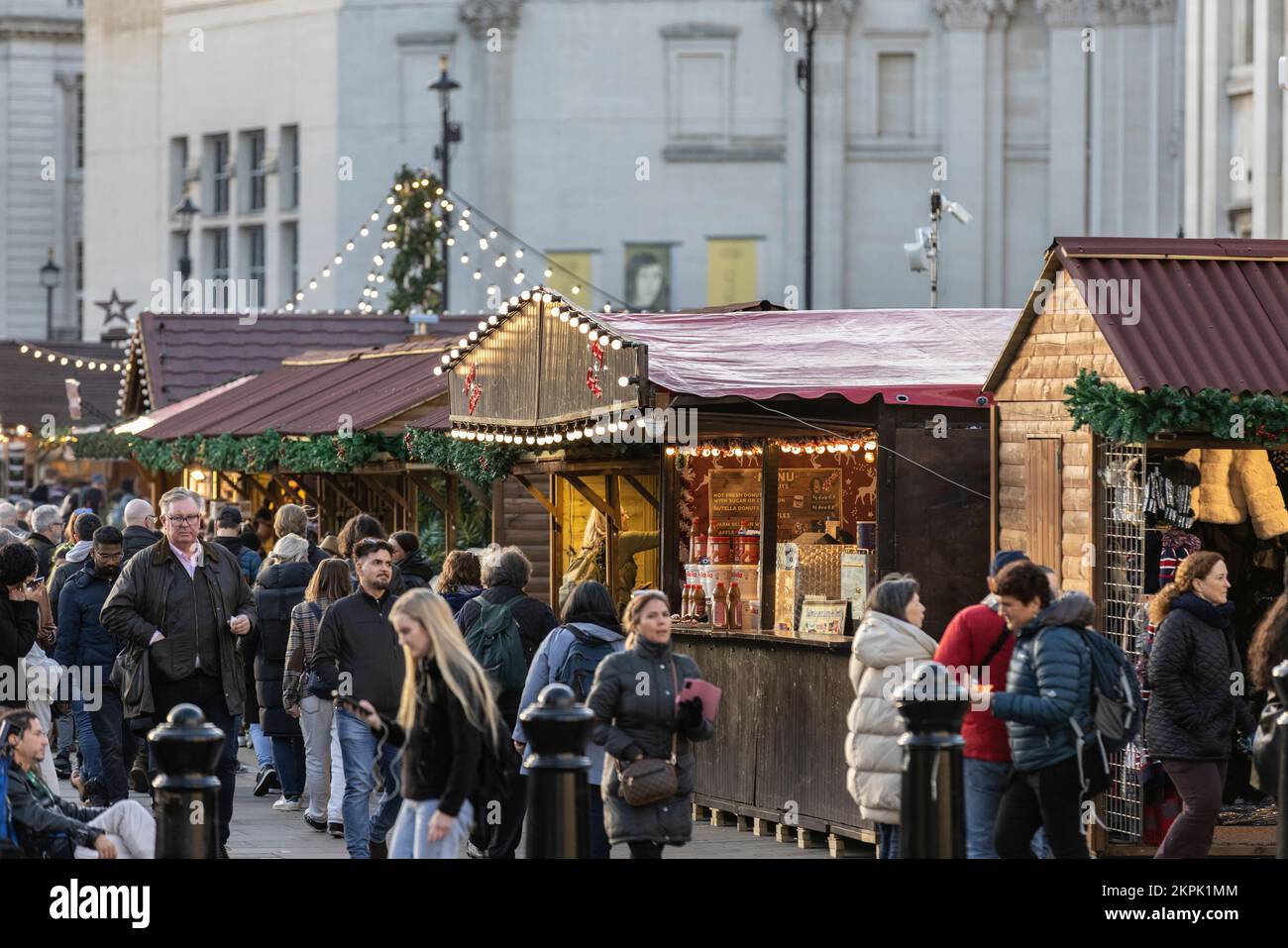 Yuletide Christmas market stalls situated on Trafalgar Square, seasonal ...