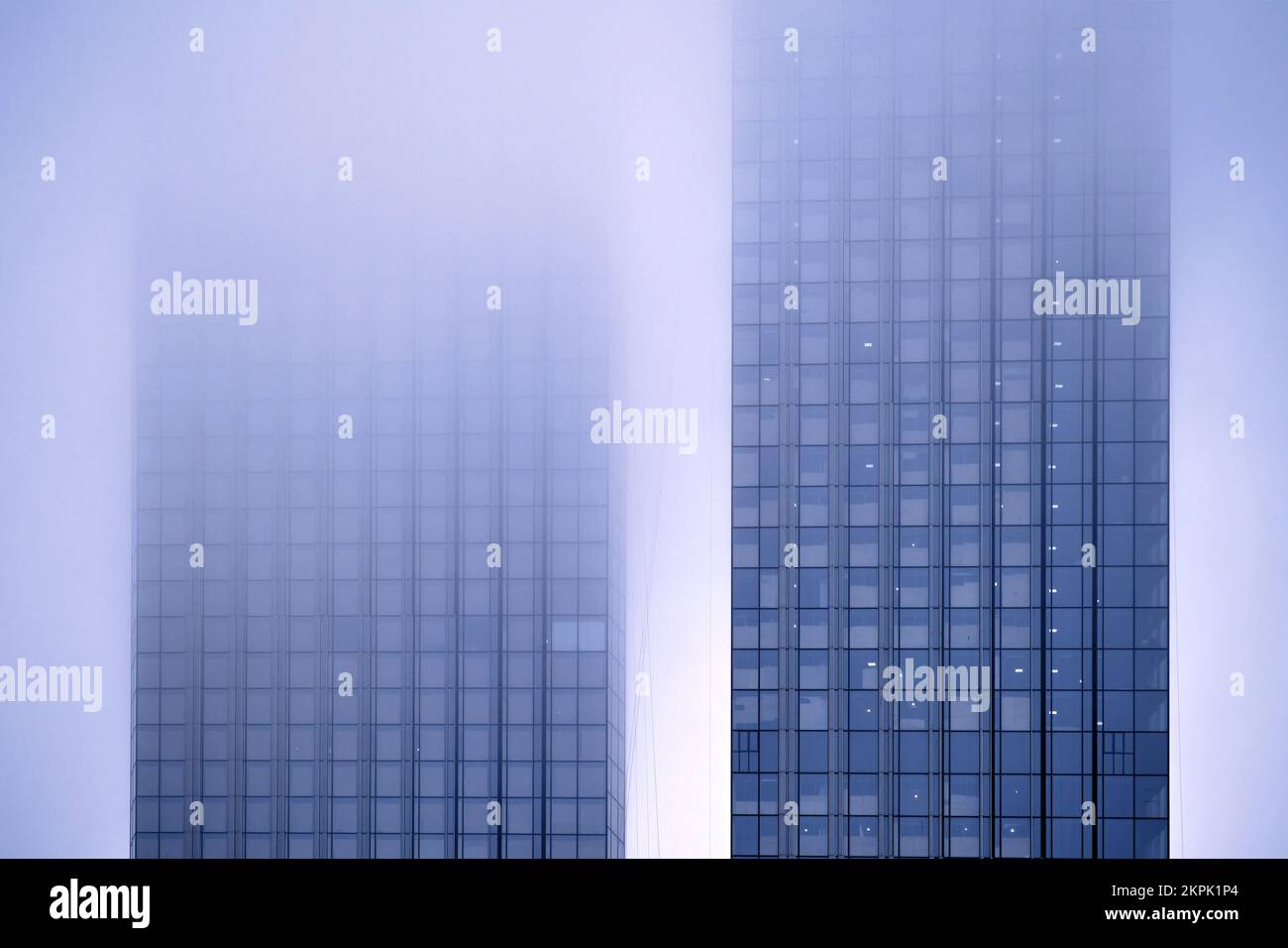 Windows of skyscrapers in the fog, background copy space. Metal ...