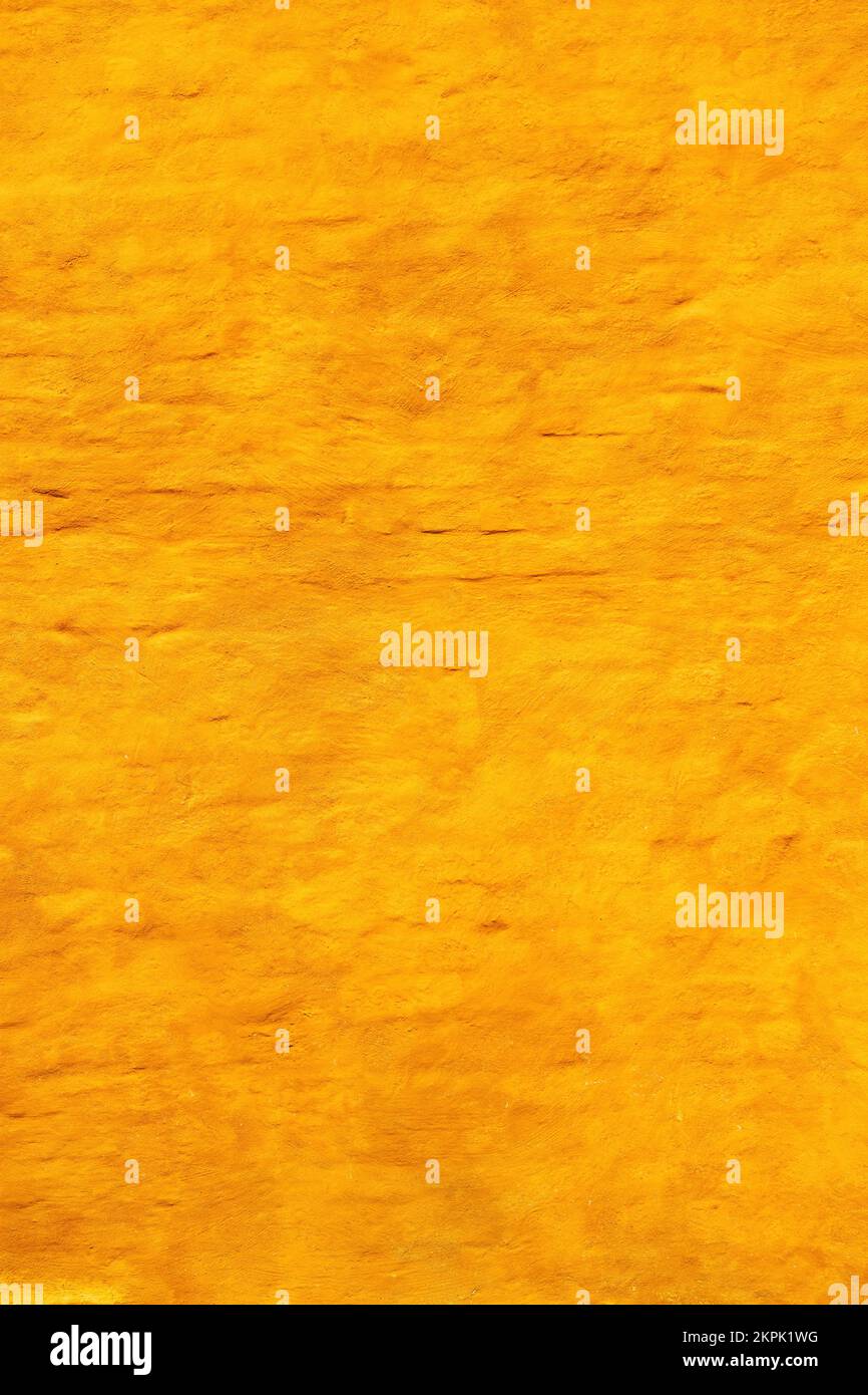 Yellow brick wall facade as background. Old building exterior wall ...