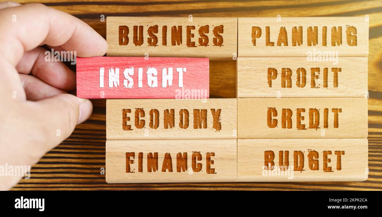 Business and finance concept. From a set of wooden blocks with ...