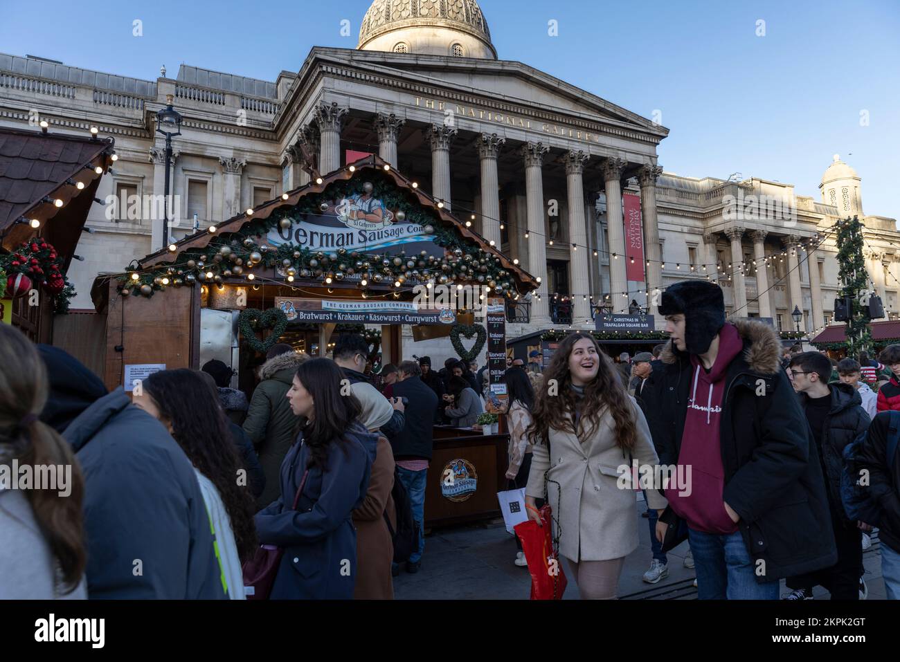 Yuletide Christmas market stalls situated on Trafalgar Square, seasonal ...