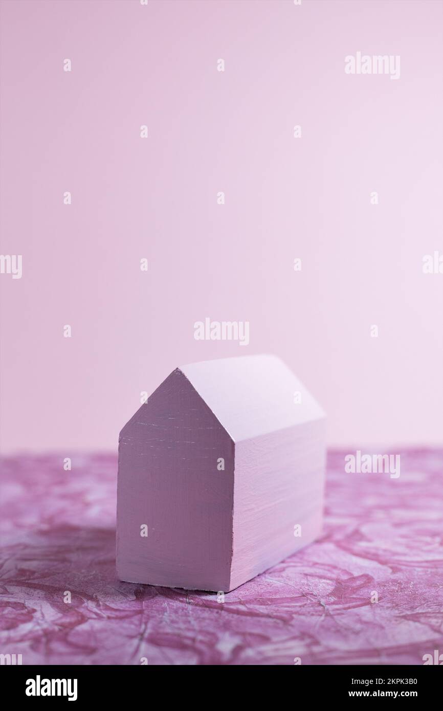 Pink block house on a pink background Stock Photo - Alamy