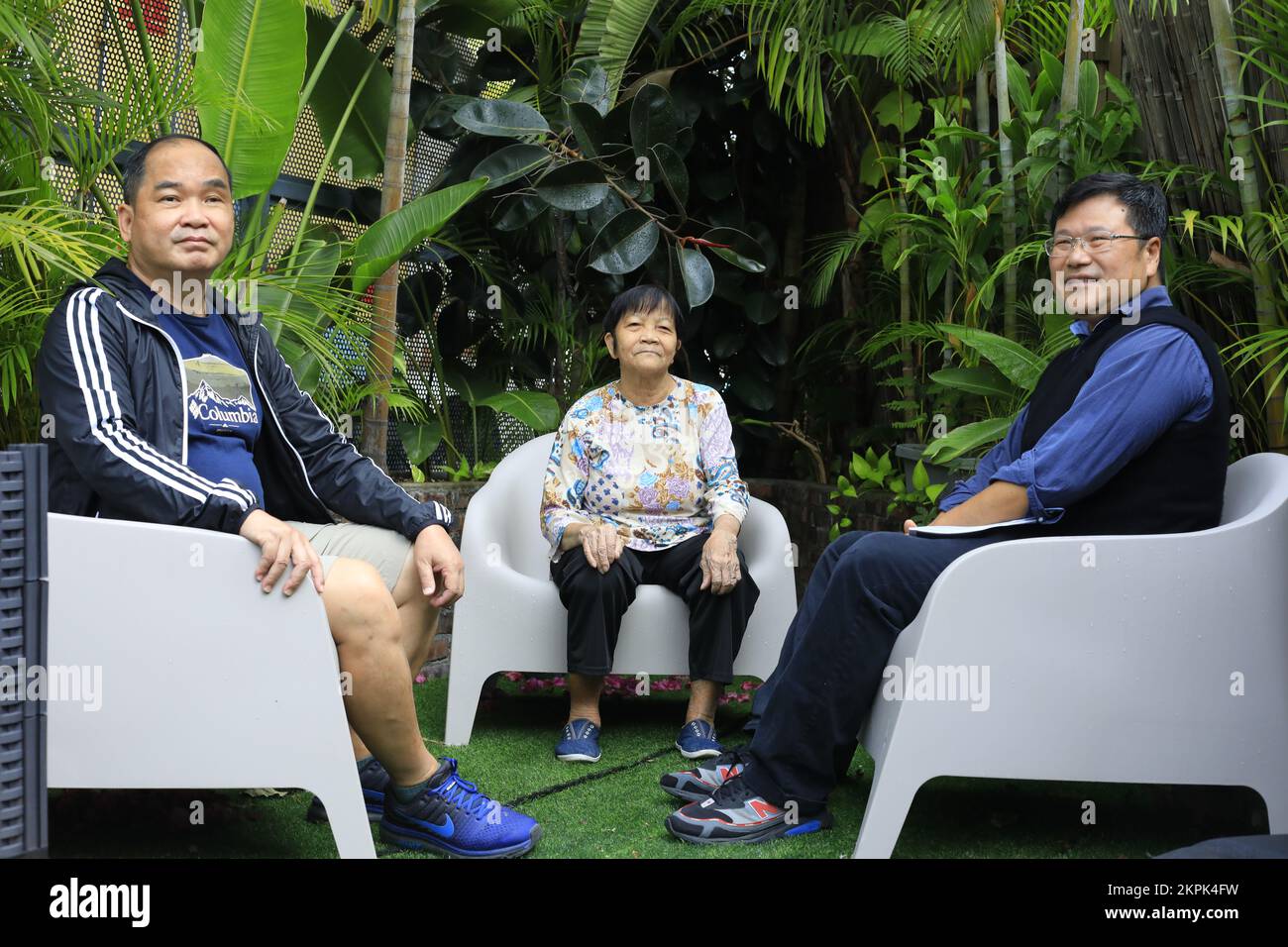 From left, Ho Kai-Shing, Ou xiulan and Pastor Stephen Chan photographed ...