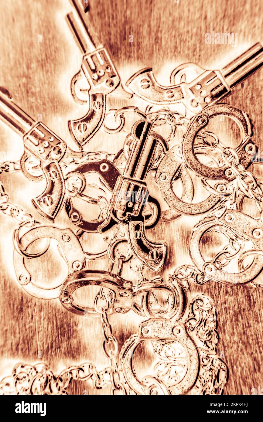 Wild west sheriff art on a mix of pistols and hand cuffs from an old ...