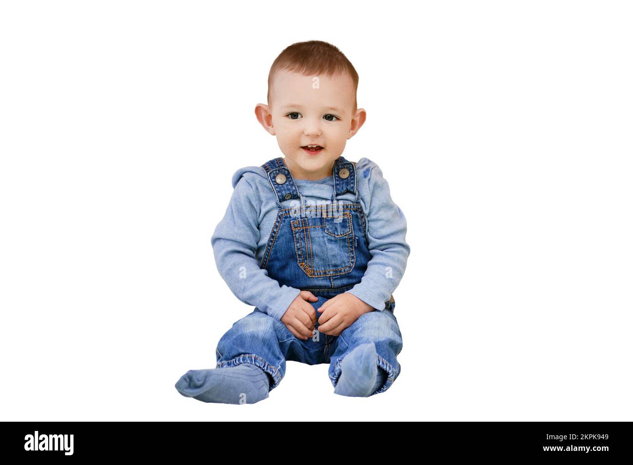 Happy toddler baby boy sitting in a children tent, playroom, isolated ...