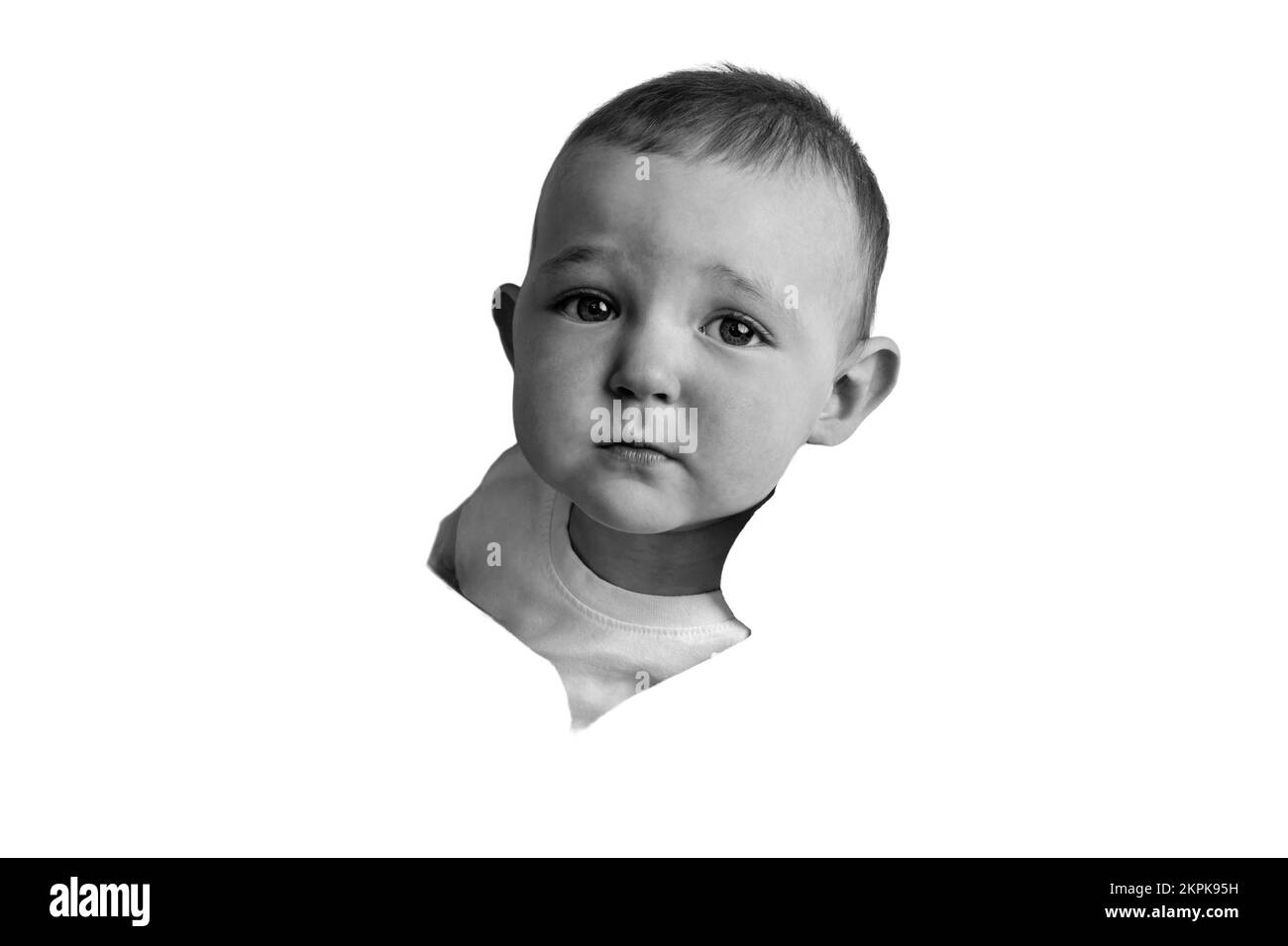 Sad child looks out of a hole, isolated on a white background. Cry baby ...