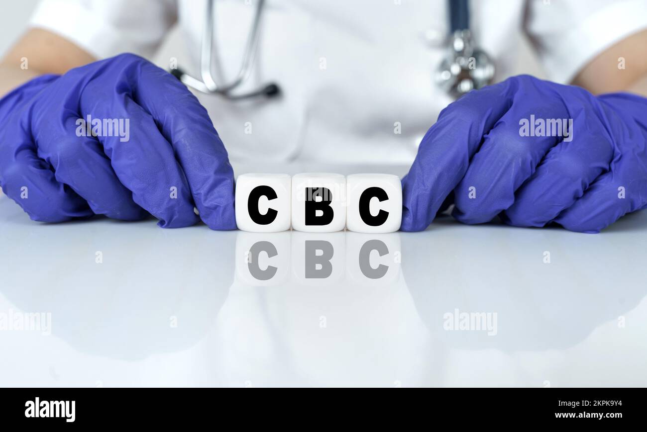 Medicine and health concept. The doctor put together a word from cubes ...