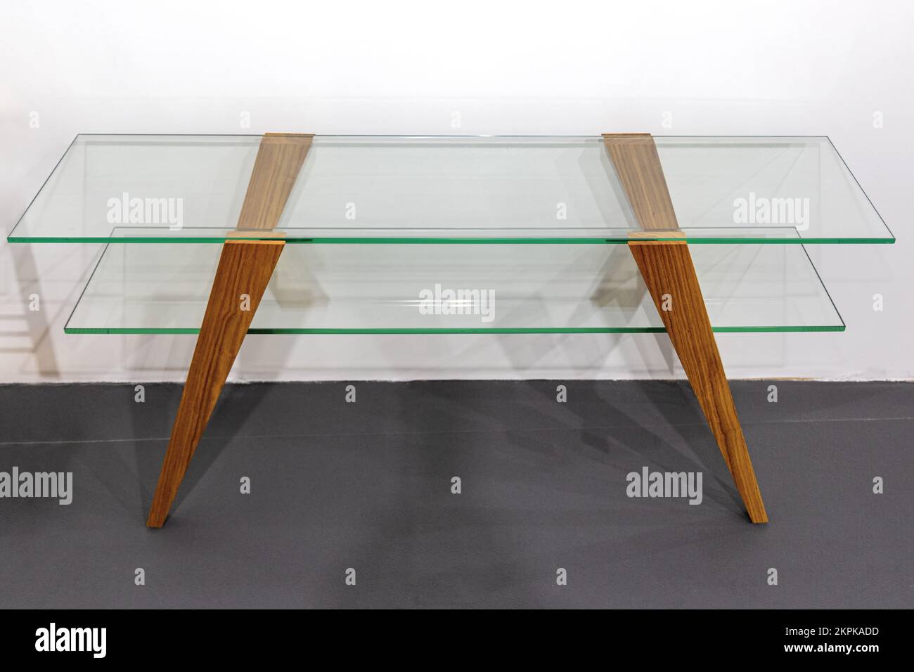 Desk With Double Glass and Wooden Legs See Through Furniture Stock ...