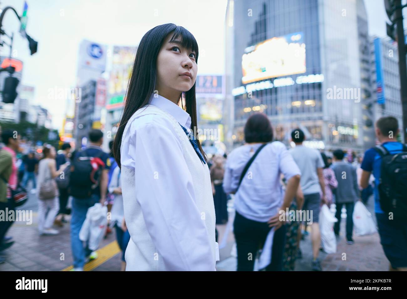 Japanese high school girl at Shibuya Scramble Crossing Stock Photo - Alamy