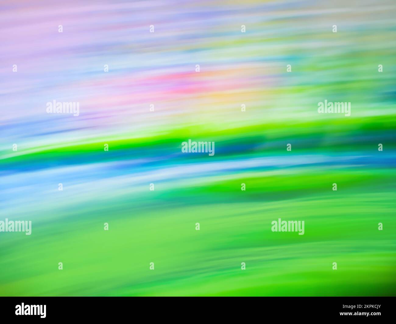 Wonderful blurry landscape with green hills and sunset on blue sky ...