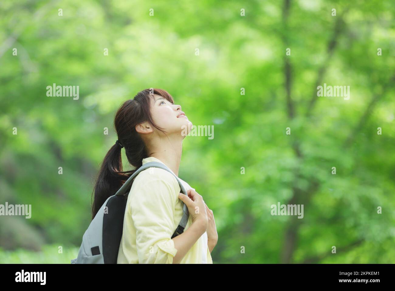 Fresh greenery and Japanese woman Stock Photo - Alamy