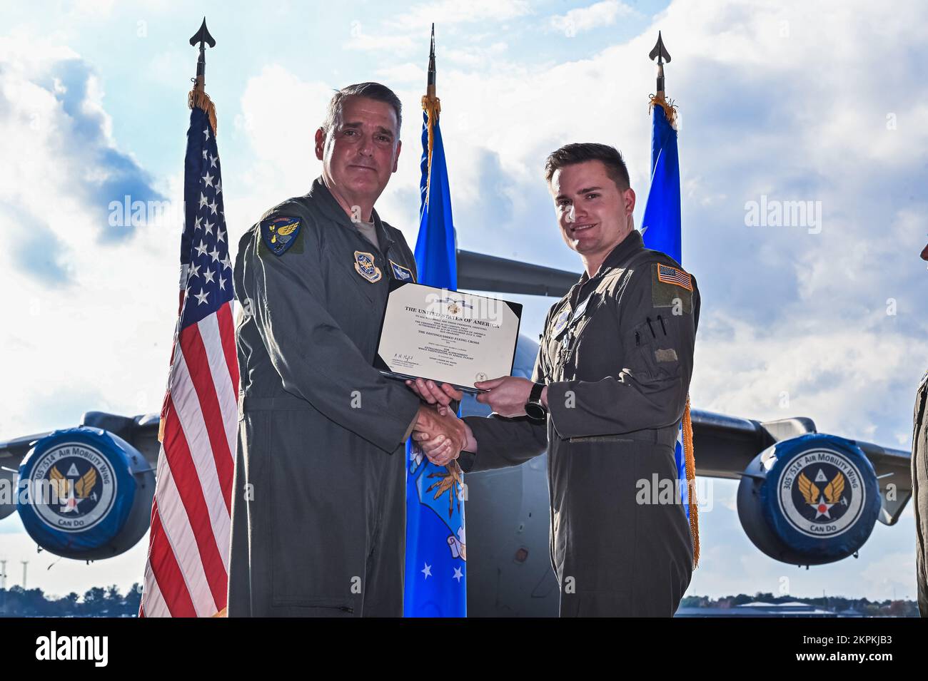 U.S. Air Force 1st Lt. Mark Lawson, 6 Airlift Squadron C-17 pilot, is ...