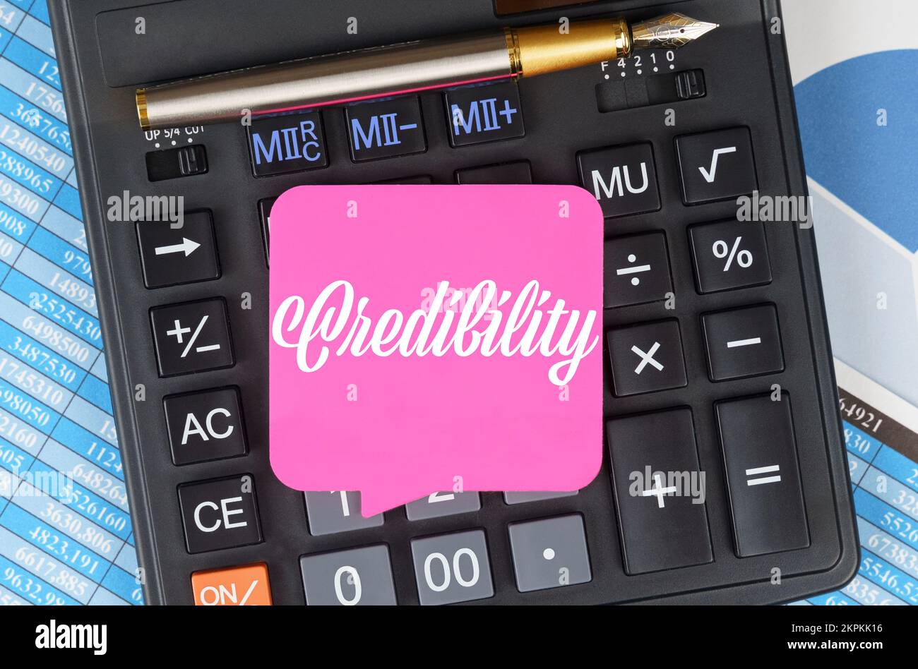 Finance and economics concept. On the desktop are charts, reports, a ...