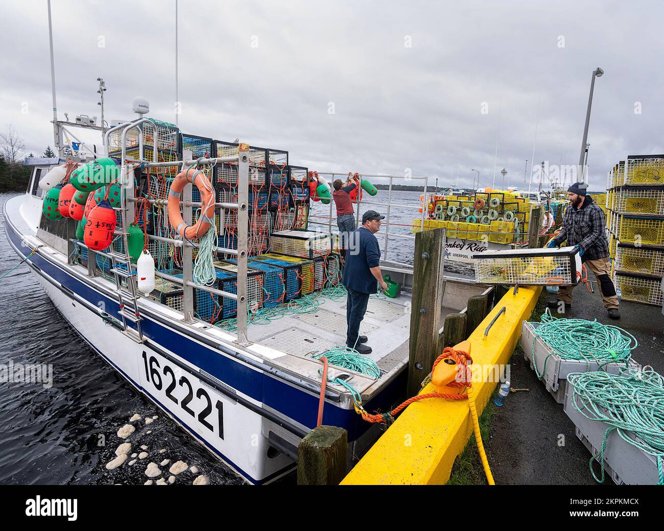 Crew members load pots and buoys in Port Medway, N.S. on Monday, Nov ...