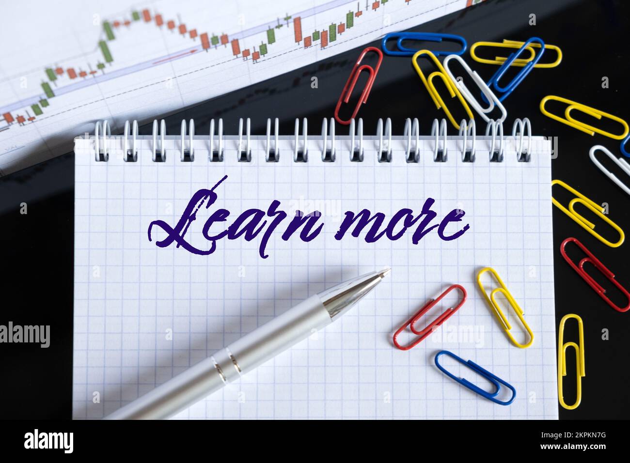 Finance and economics concept. On the desktop are a forex chart, paper ...