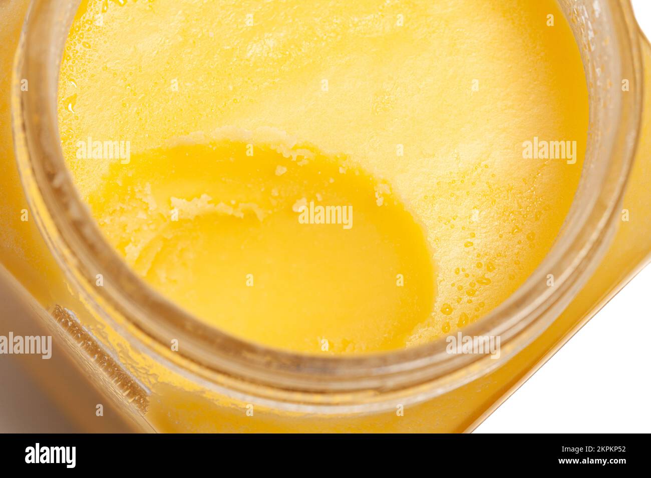 Ghee in jar isolated on white background,top view Stock Photo - Alamy