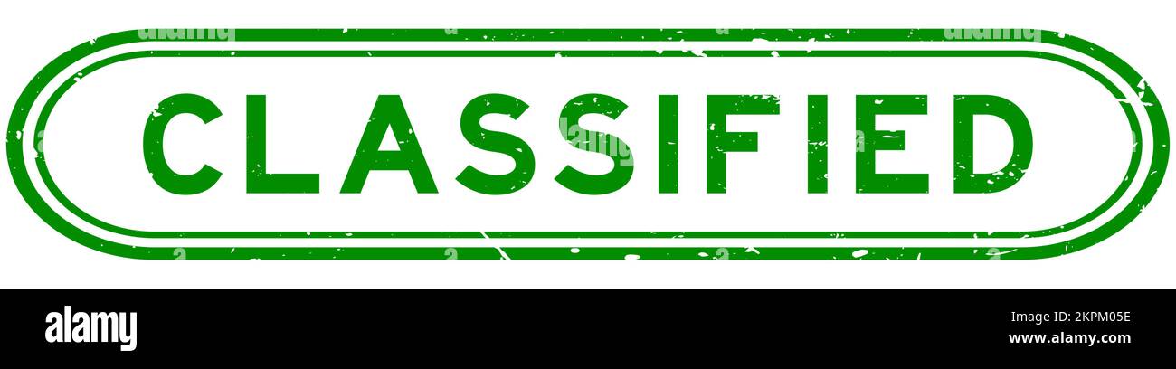 Grunge green classified word rubber seal stamp on white background ...