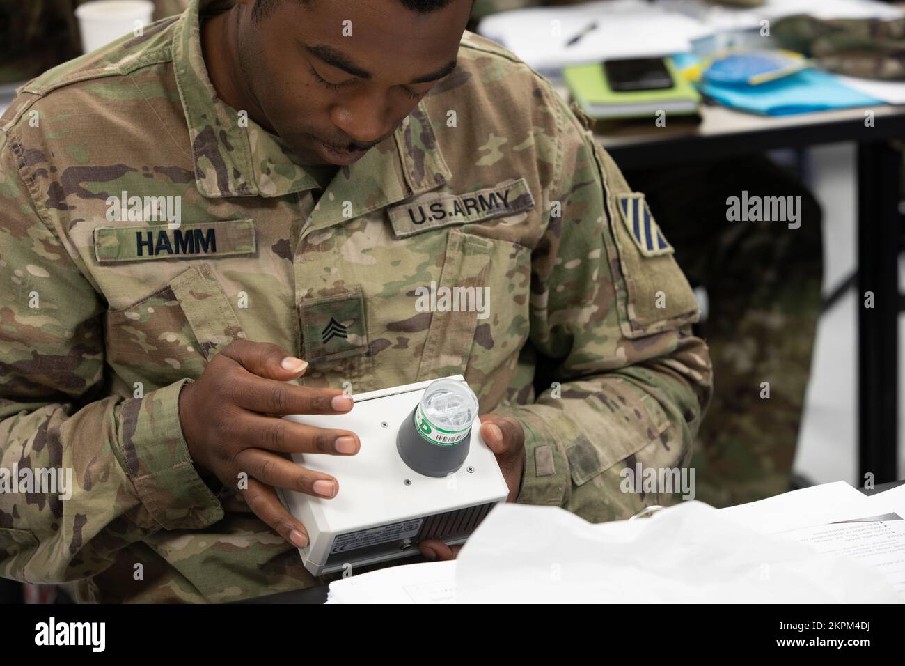 Sgt. Evan Hamm, a brigade mold remediation team member assigned to the ...