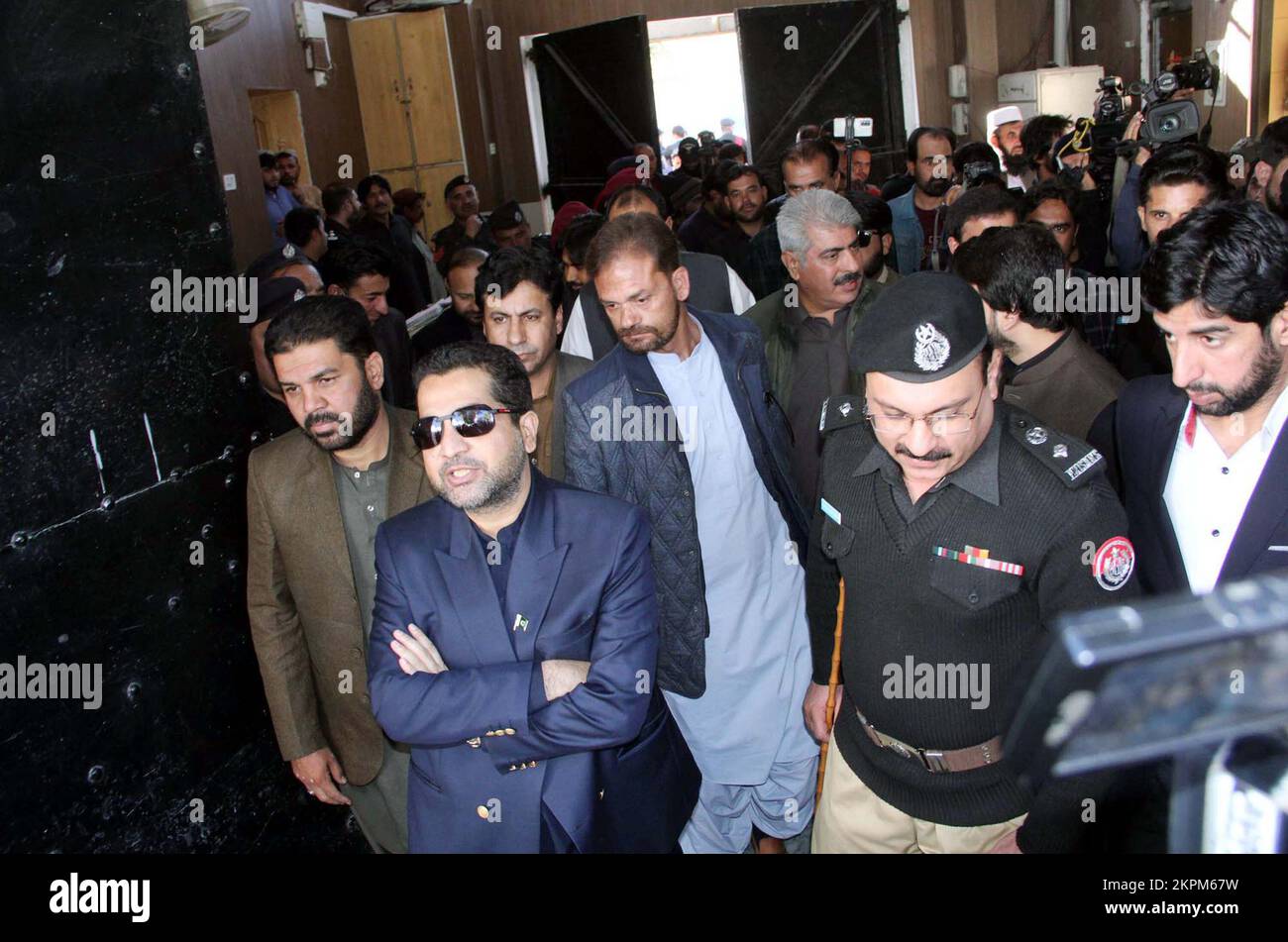 Balochistan Interior Minister, Mir Ziaullah Lango is being briefed by ...