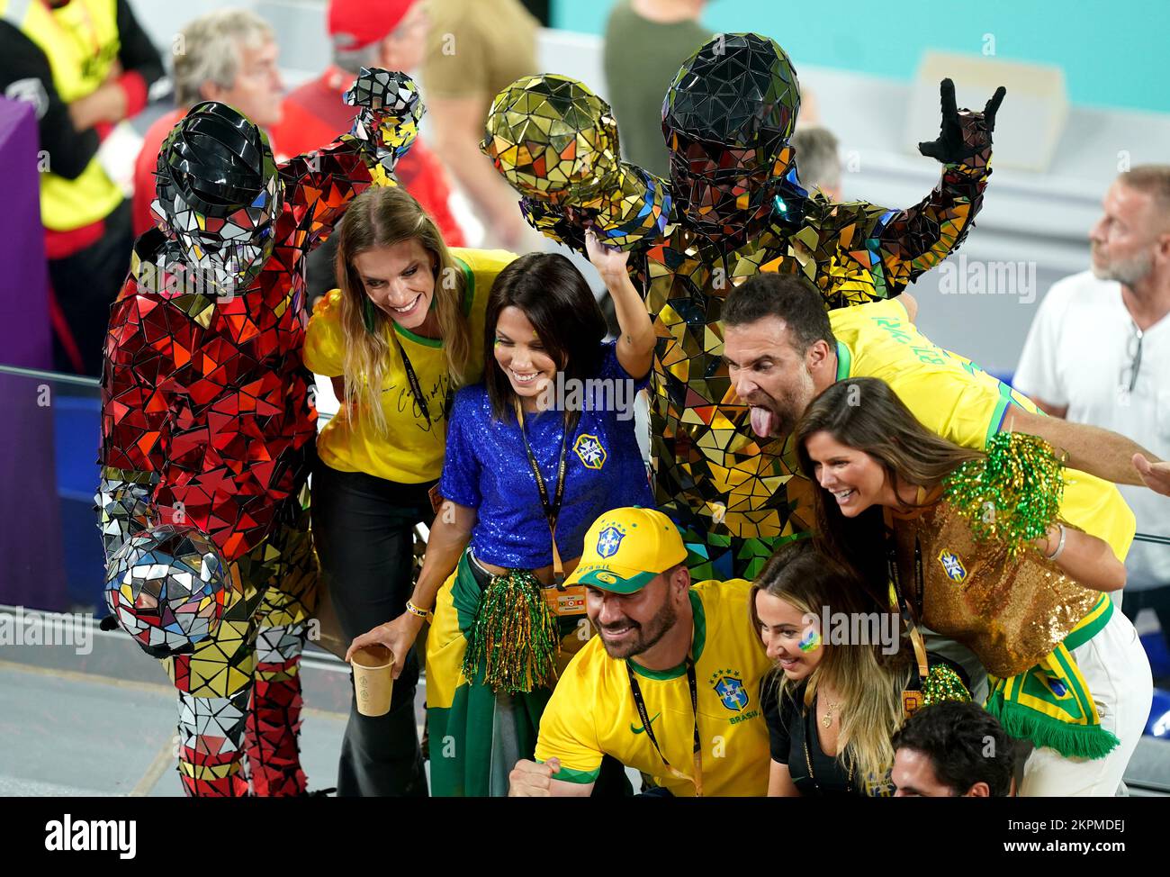 Brazil fans pose for a photo in the stands at half-time during the FIFA ...