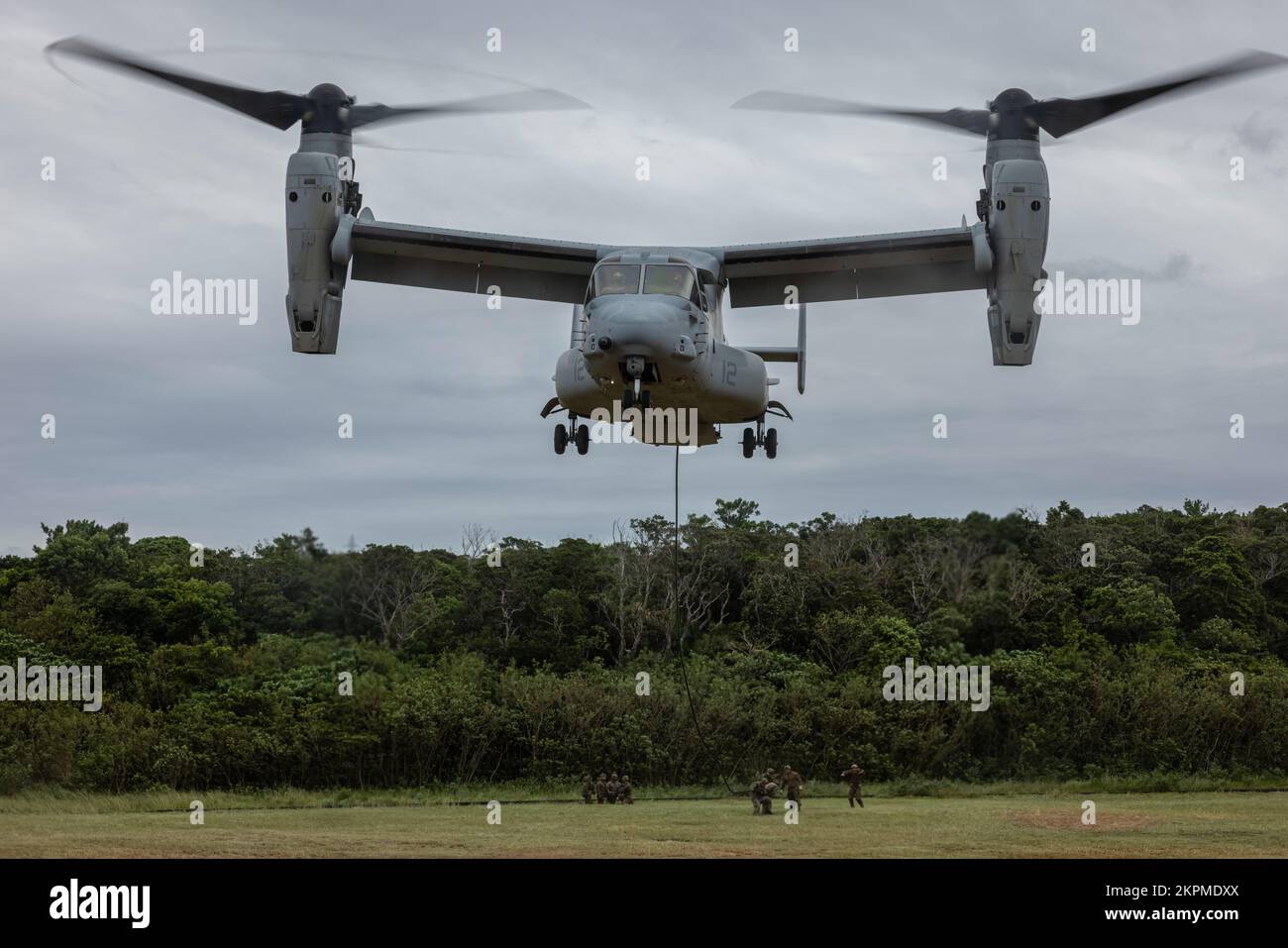 U.S. Marines with III Marine Expeditionary Force (MEF) fast rope from ...