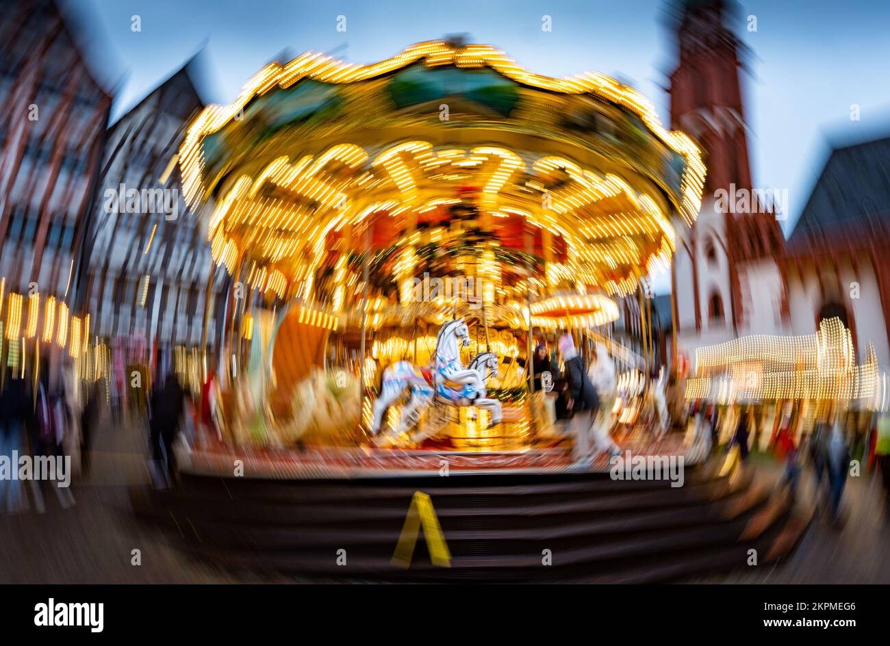 28 November 2022, Hessen, Frankfurt/Main: Horse figures turning with ...