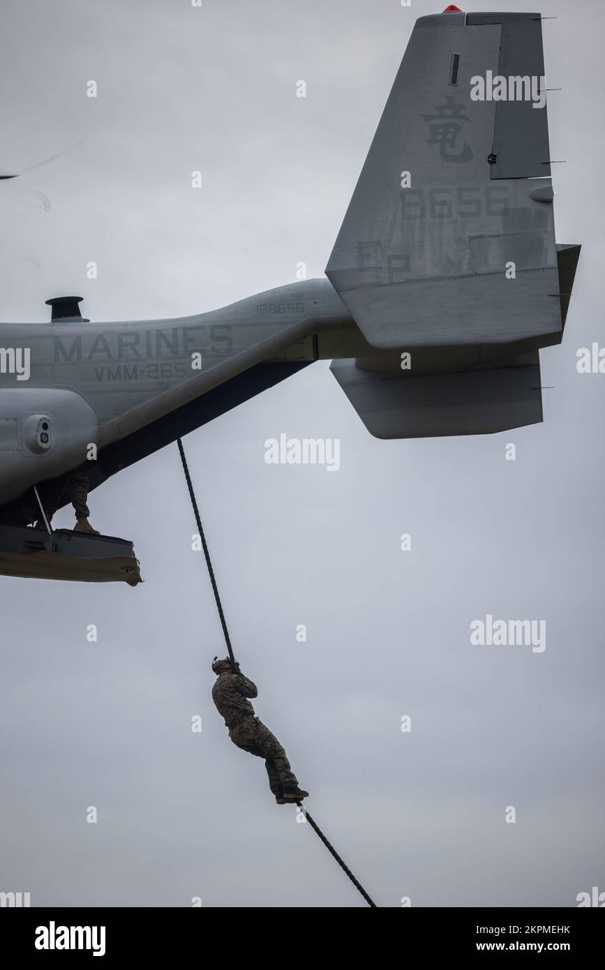 U.S. Marines with III Marine Expeditionary Force (MEF) fast rope from ...