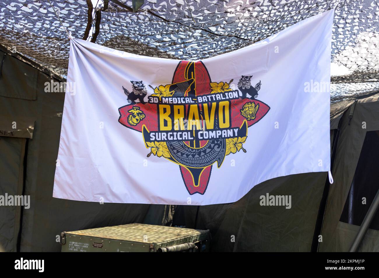 A banner for Bravo Surgical Company, 3d Medical Battalion, is displayed ...