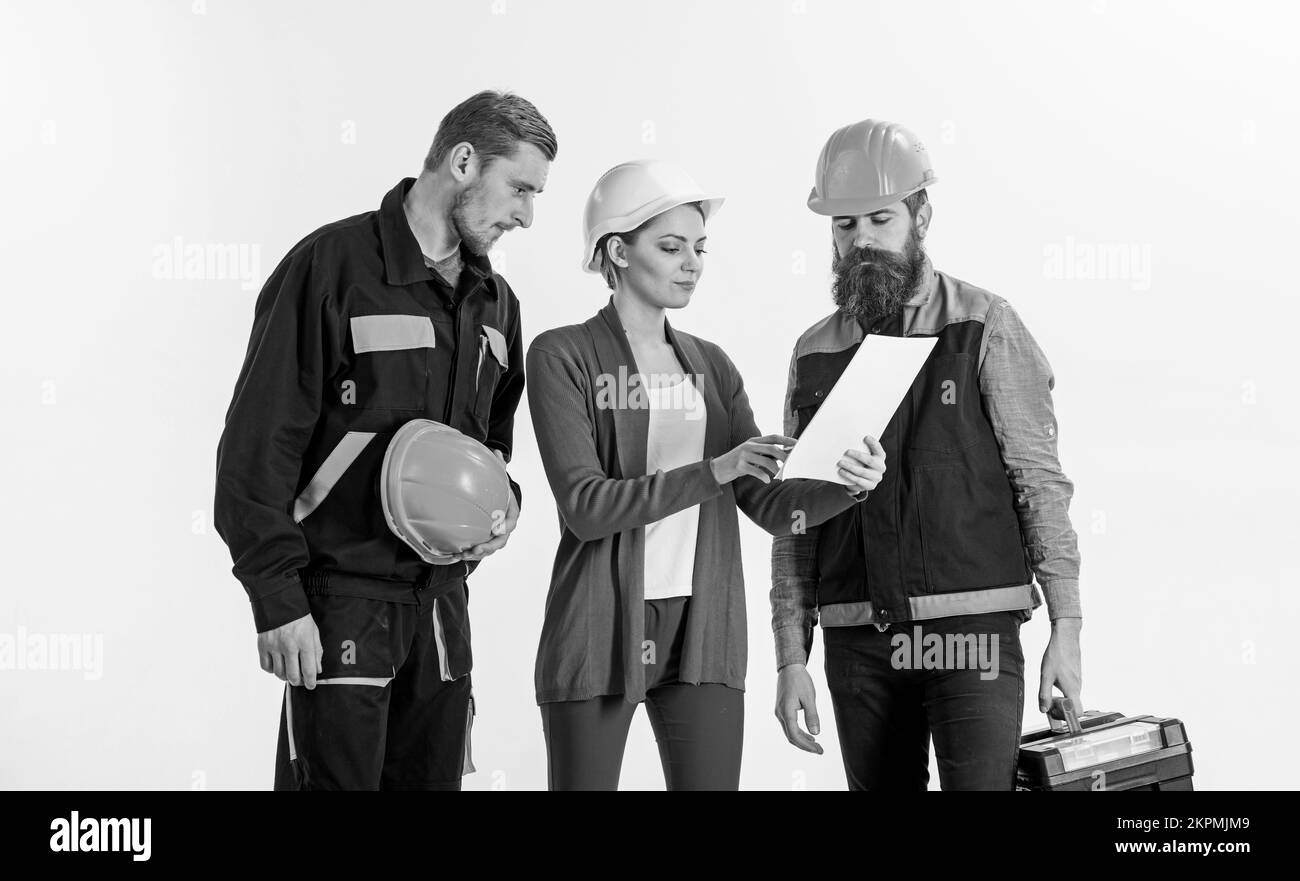 Builders and engineer work together. Management concept Stock Photo - Alamy