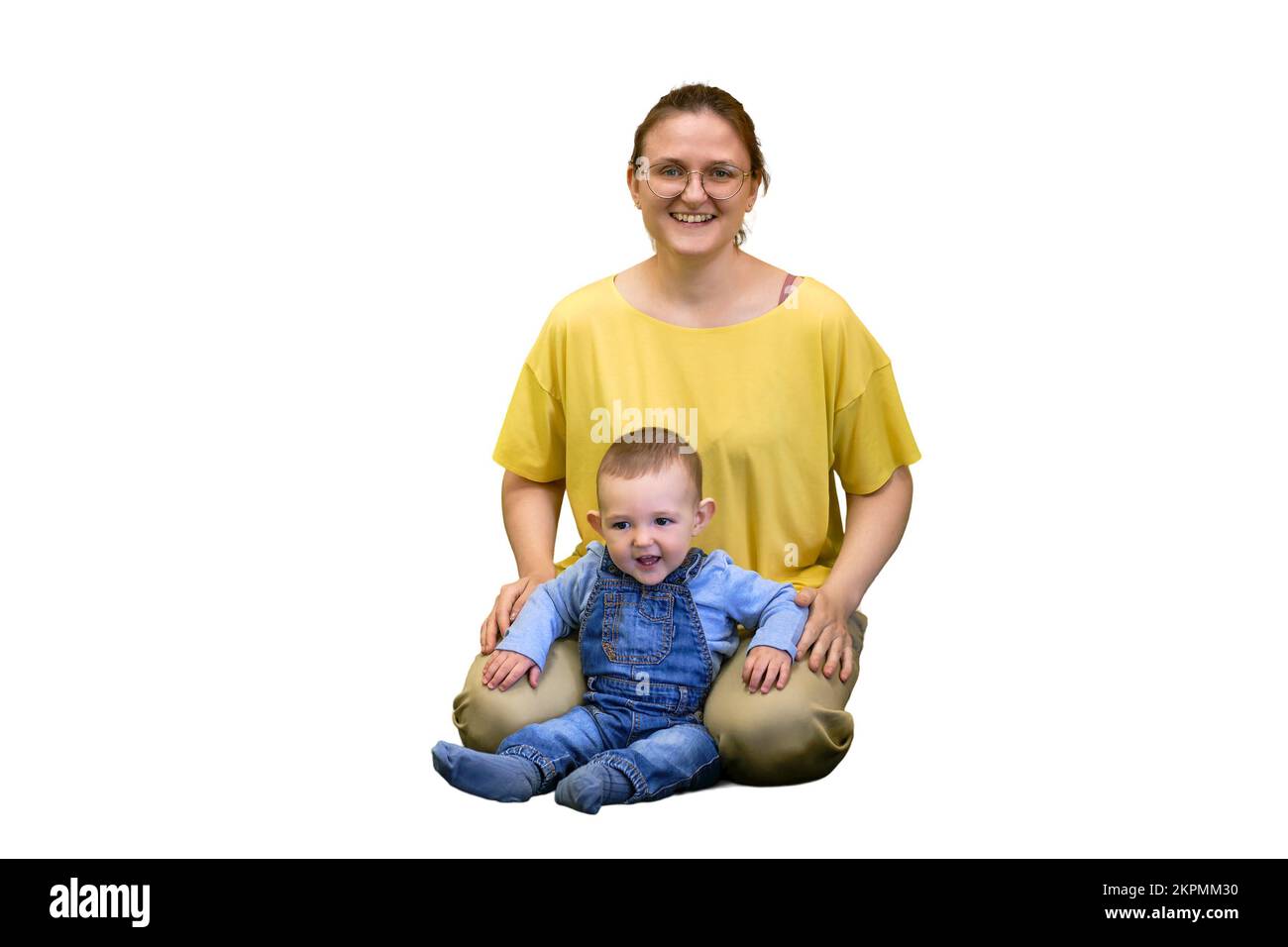 Happy toddler baby boy sits with his mother, isolated on a white ...