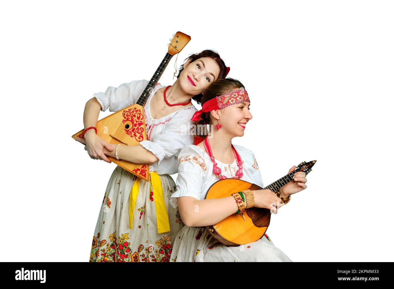 Women musicians in Russian folk dresses with musical instruments on a ...