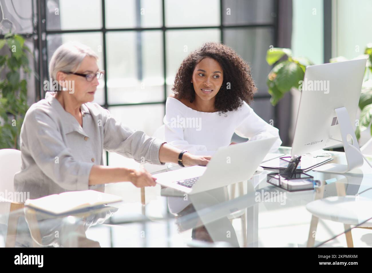 Software Development Team Discussing Algorithms On Computer Screen In 6565
