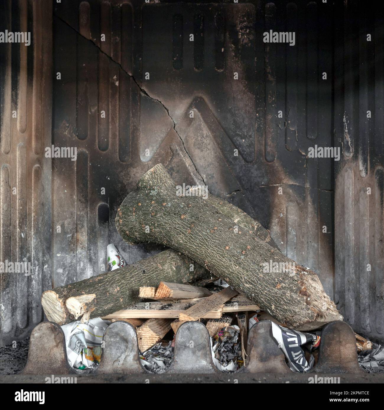 Unlit fire place and non burning logs inside background. Unlit ...