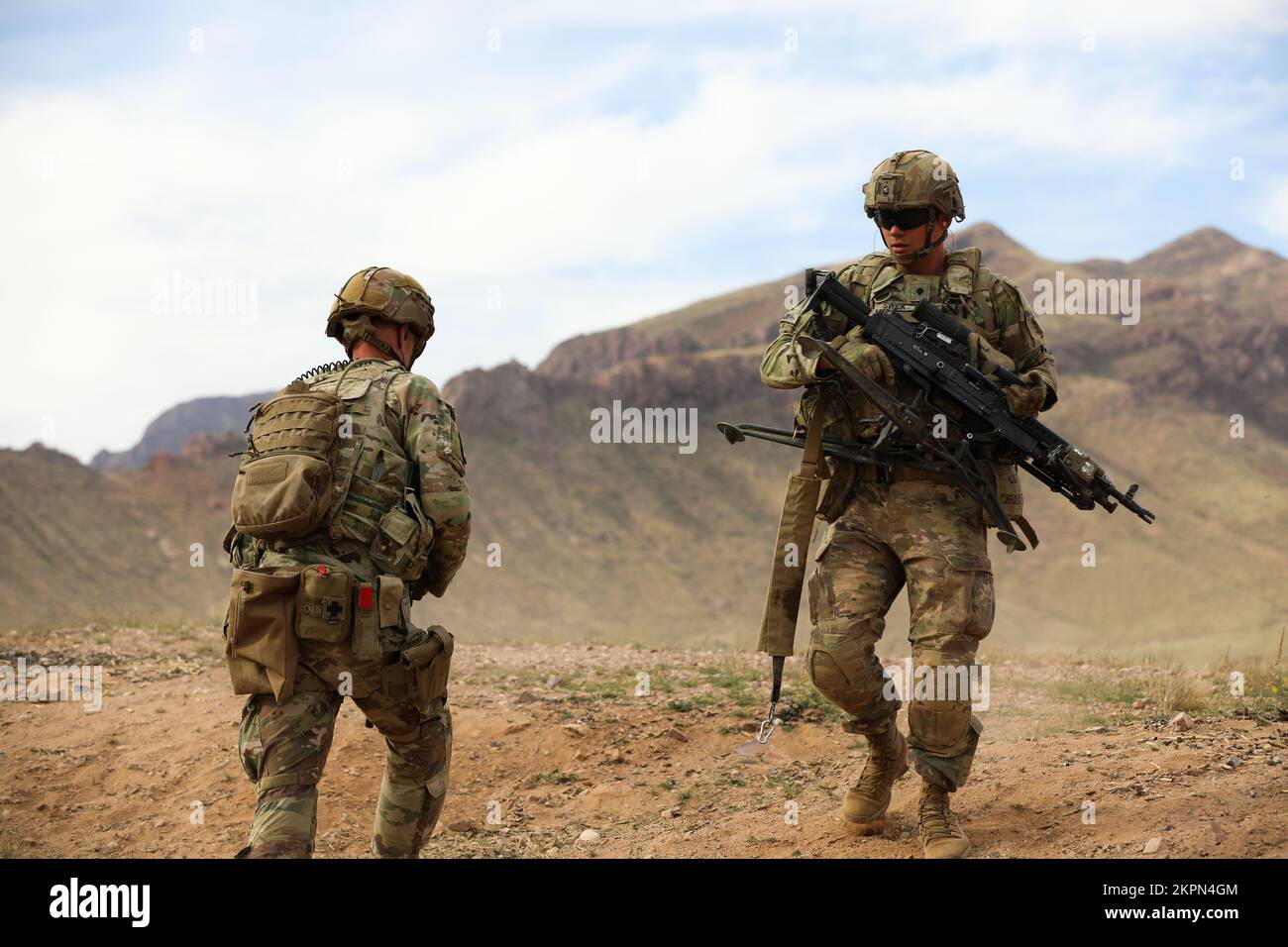 A U.S. Army Soldier, left, relieves U.S. Army Spc. Xavier Swick, right ...