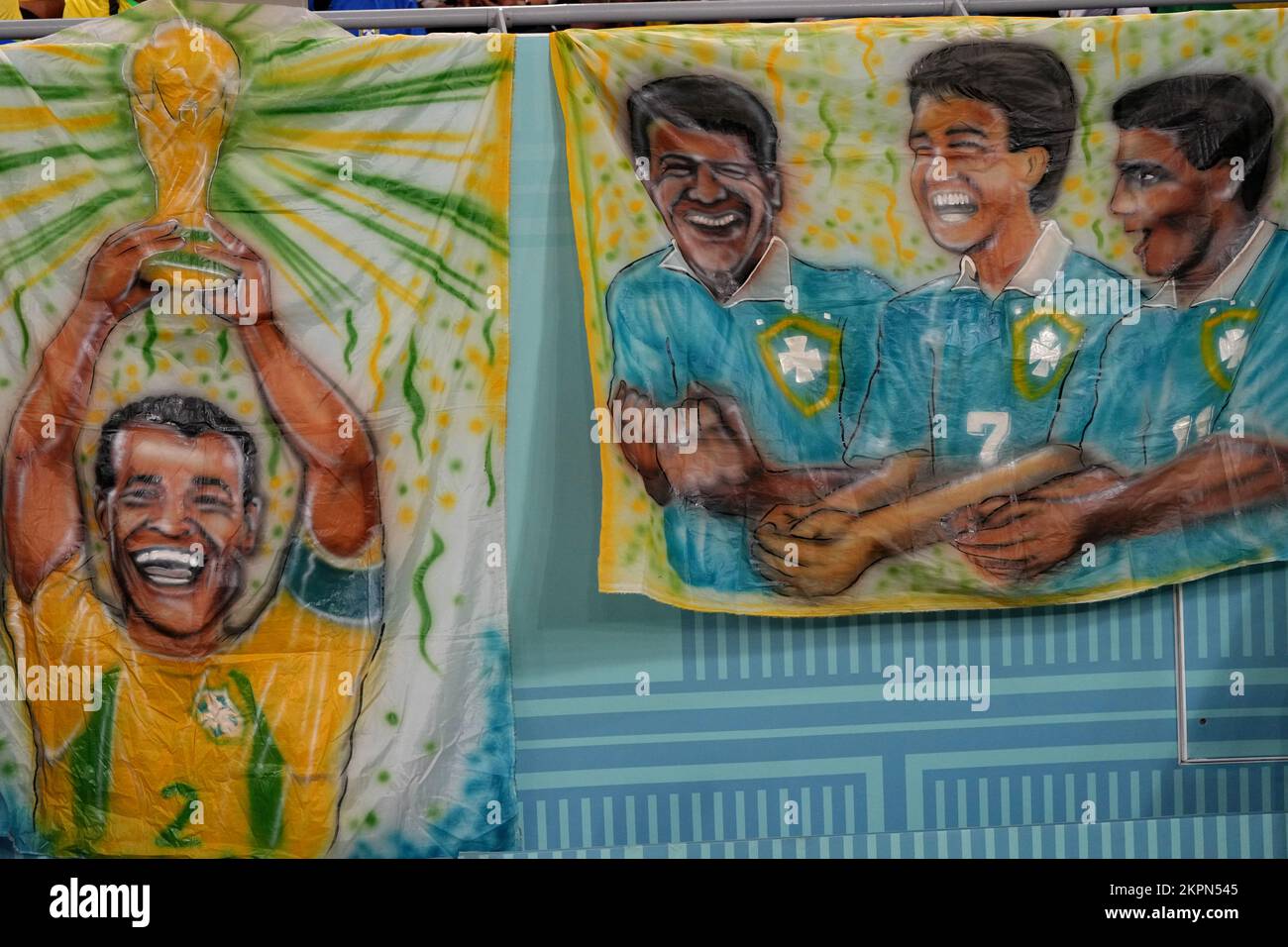 A banner of former Brazil captain Cafu lifting the World Cup trophy is ...