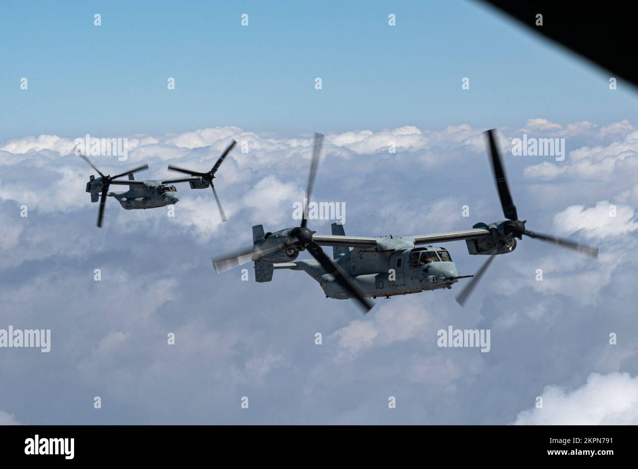 Two U.S. Marine Corps MV-22 Osprey, assigned to Marine Medium Tiltrotor Squadron 266 (VMM 266 ...