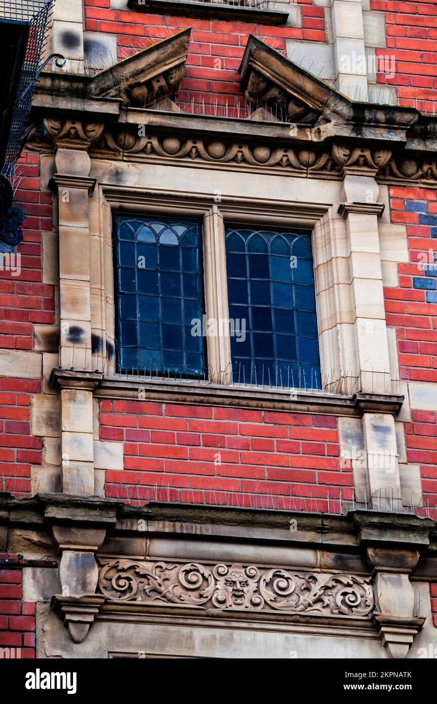 Classical architectural elements of a broken pediment, egg and dart ...