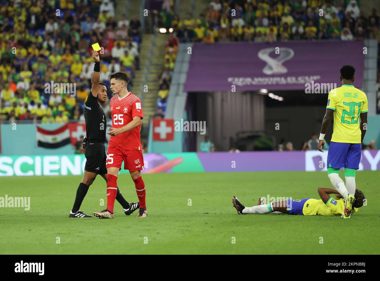 Doha, Qatar. 28th Nov, 2022. Fabian Rieder (2nd R) of Switzerland ...