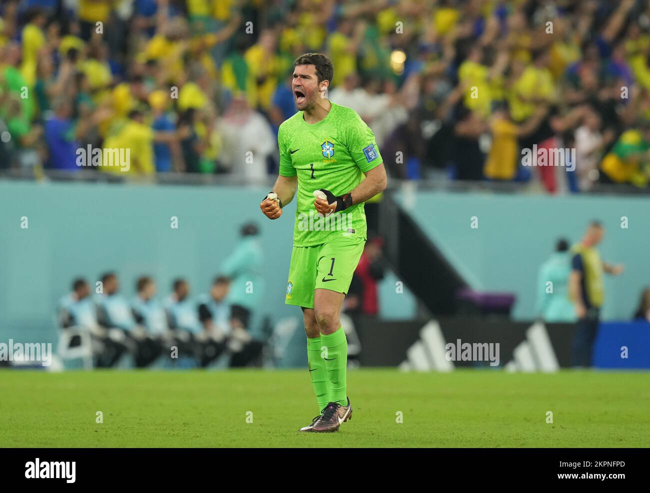 Brazil goalkeeper Alisson celebrates their side's first goal of the ...