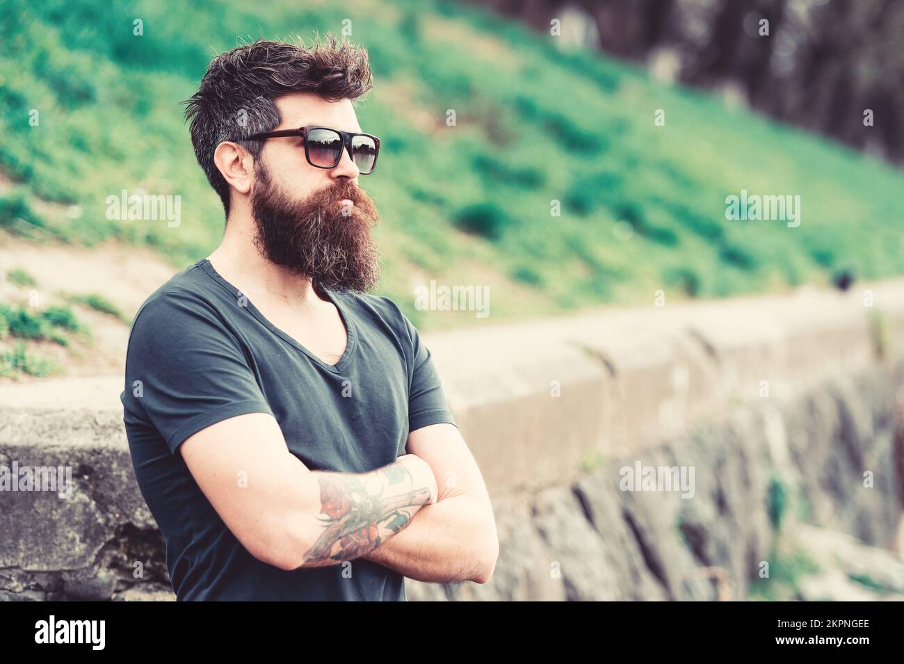 Barbershop and style concept. Man with beard and mustache on strict ...